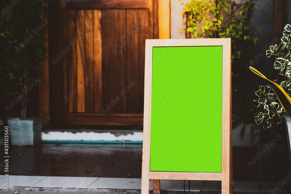 The restaurant sign has a green screen to insert content or text or ...