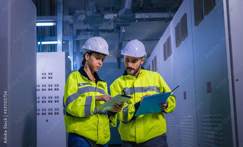 Engineer checking and inspecting at MDB panel .they working with ...