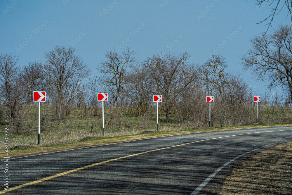 road sign overtaking is prohibited. road sign dangerous turn. Stock ...