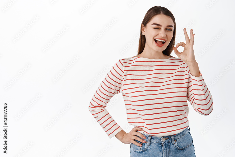Alright, everything under control. Smiling confident girl assures all ...