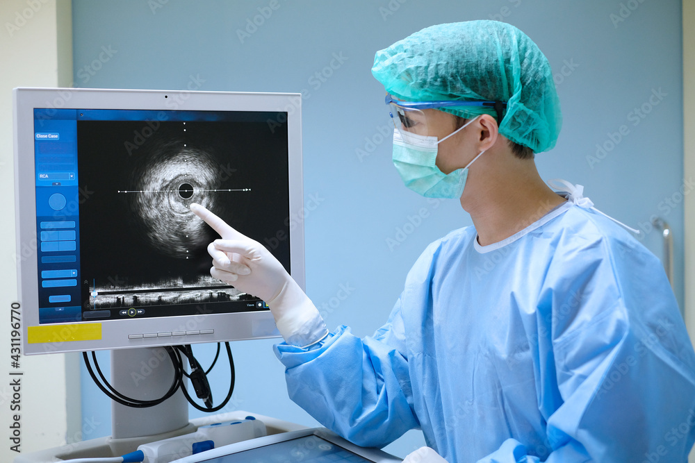 Blurred doctor used Intravascular ultrasound imaging (IVUS) machine ...
