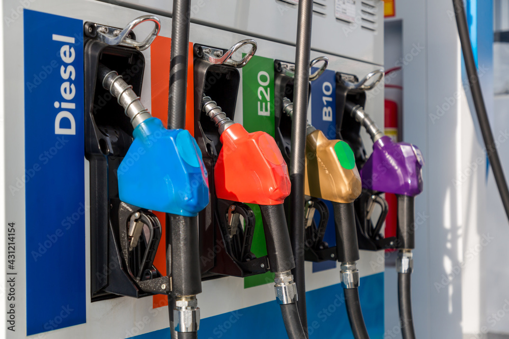 Fuel Pump, Gas Station, Gasoline. Colorful Petrol pump filling nozzles ...