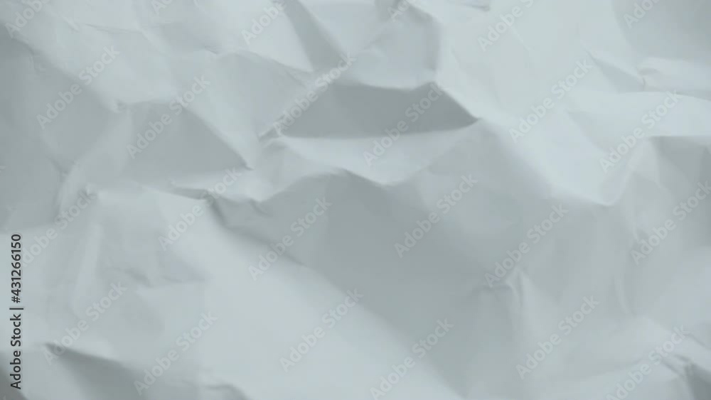 Crumpled sheet of paper. Live wallpaper abstract background. Slow ...