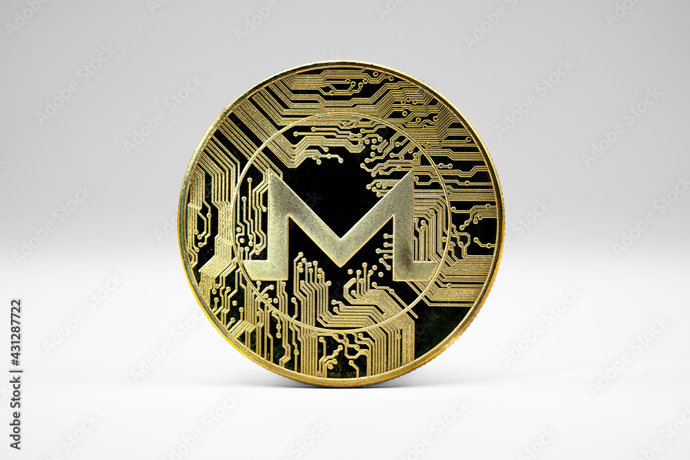 Treviso, Italy - May 1, 2021: Close up view of Monero gold coin with ...