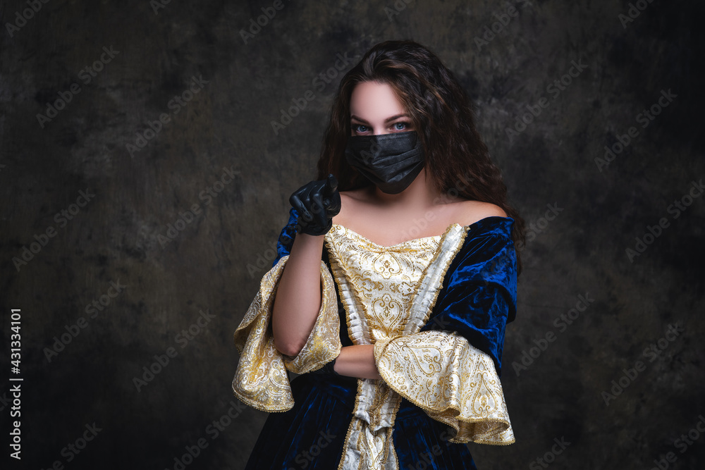 Beautiful woman in renaissance dress, face mask and gloves on abstract ...