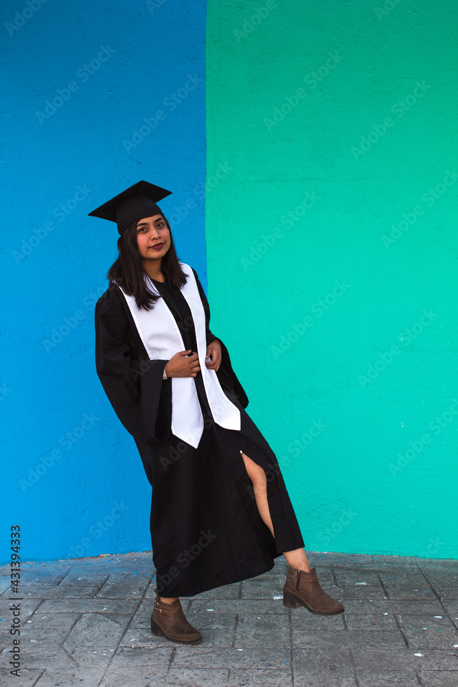 GIRL WITH BLACK TOGA AND WHITE STOLE Stock Photo | Adobe Stock