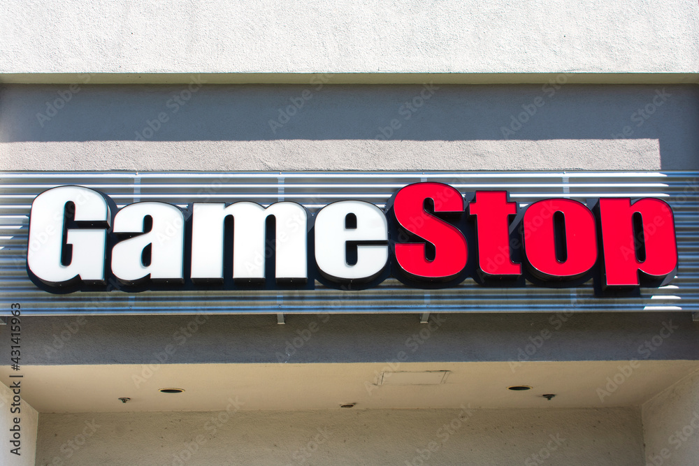 GameStop sign, logo on video game, consumer electronics, and gaming ...