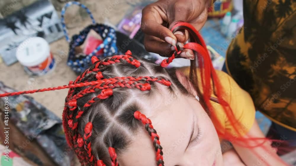Black African woman weaving African-American small braids to beautiful ...