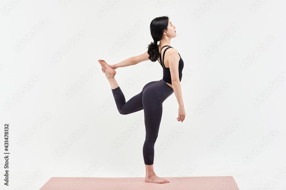 Asia korean girl long haired beautiful pilates or yoga athlete does a ...
