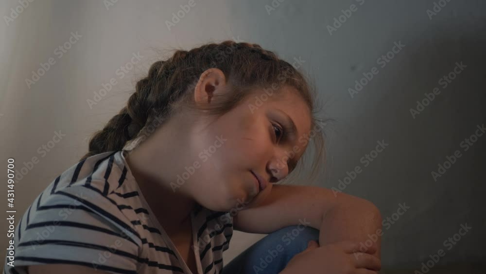 Stockvideon Girl is cry in corner. Violence against children in family ...