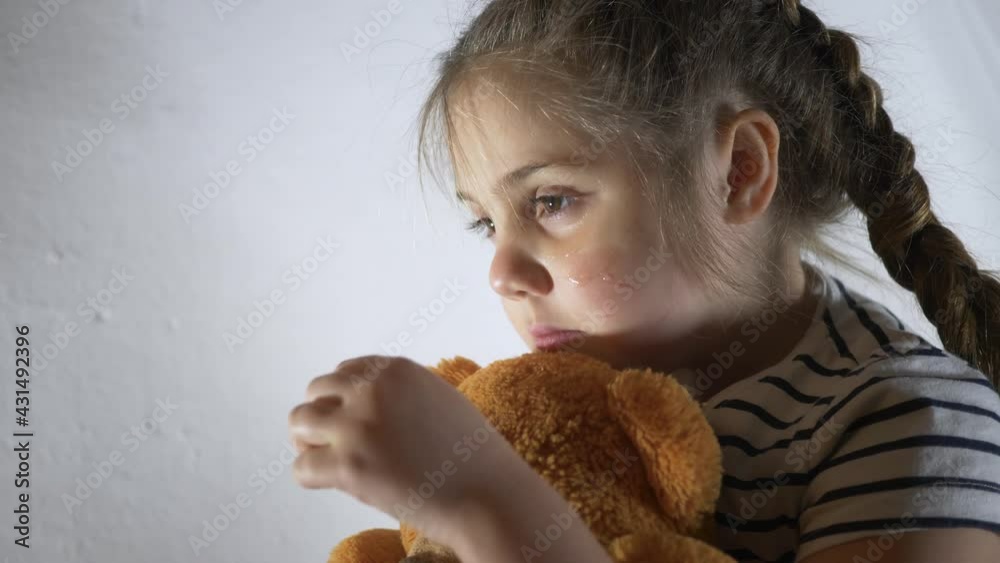 Video Stock Girl is cry in corner. Violence against children in family ...