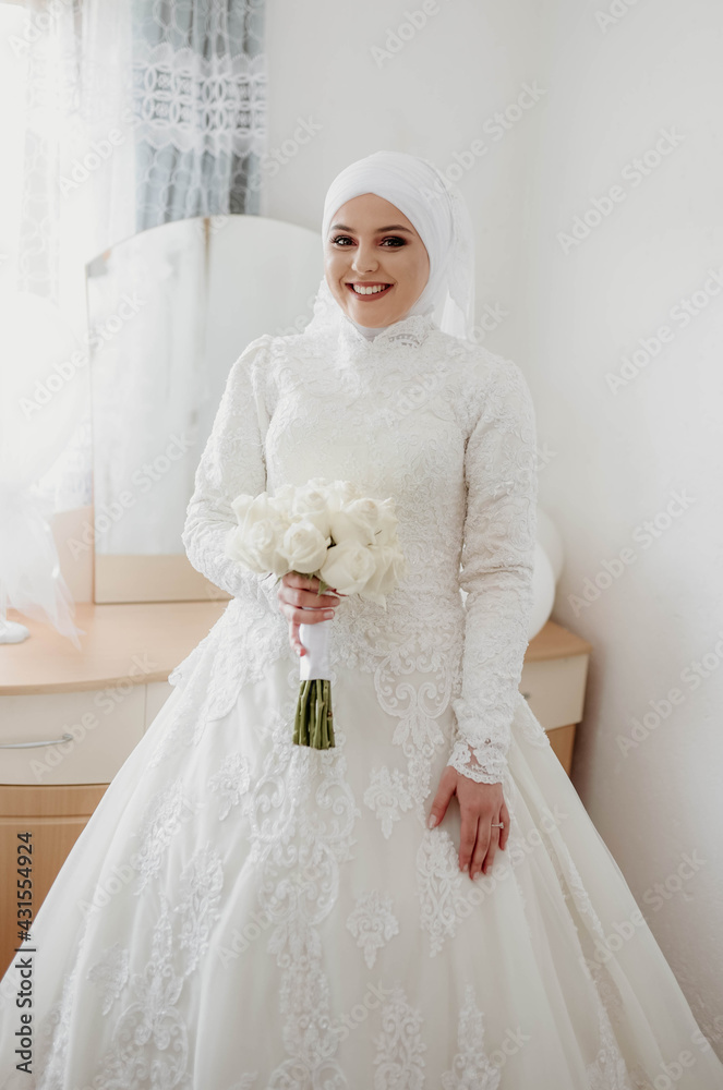 Beautiful young muslim woman. Muslim bride before wedding, wearing ...