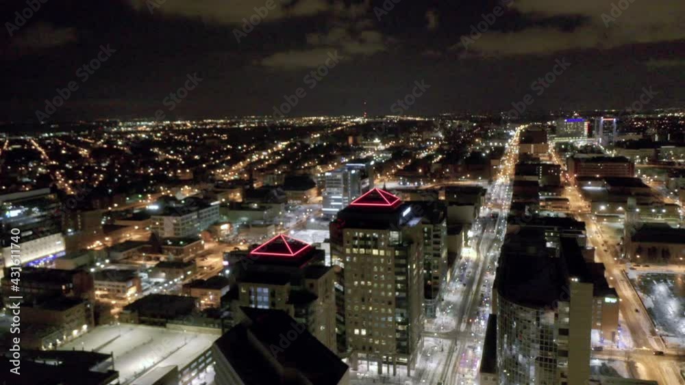 Downtown Buffalo, New York at night Aerial. Shiny glass buildings ...