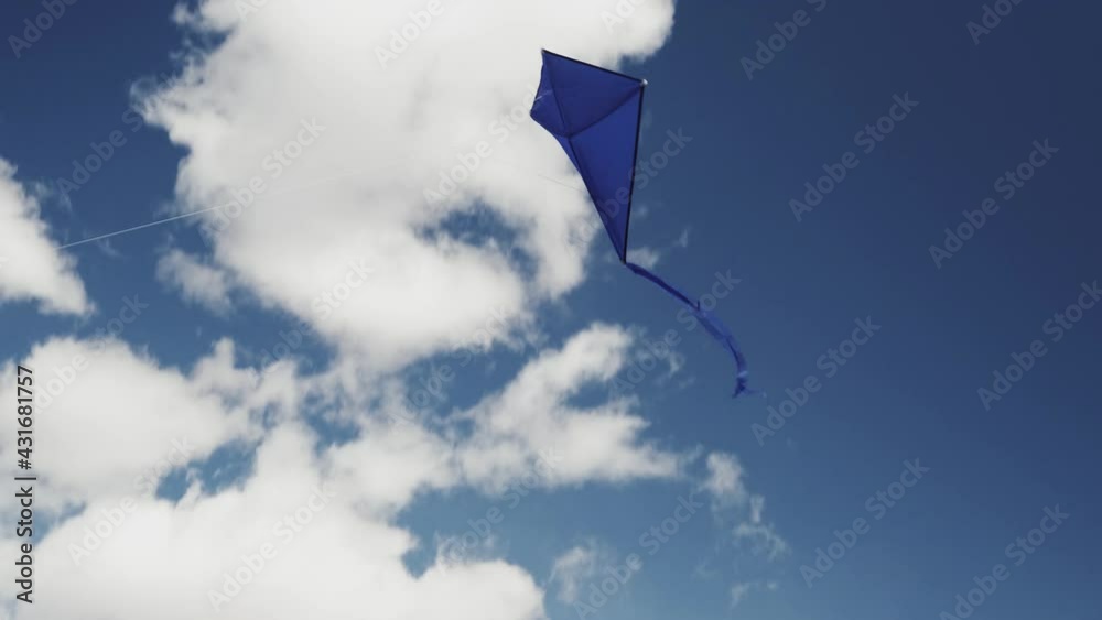 Blue kite soars in the sunset sky. Man rules kite. The concept of ...