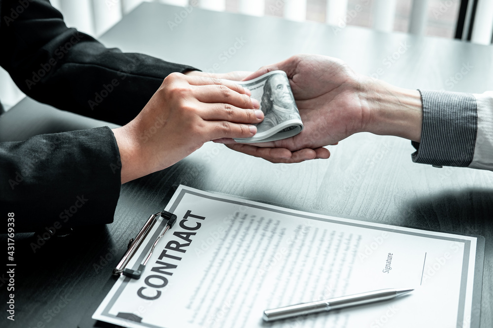 Business woman giving bribe money to businessman to bribing deal ...