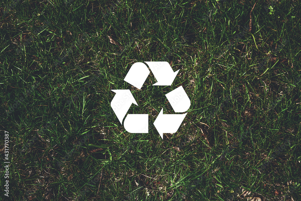 Recycling logo symbol in green.Concept of recycling the plastic ...