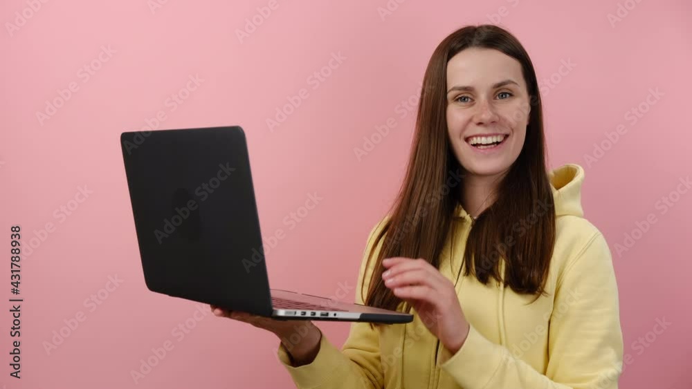Vidéo Stock Excited young millennial female working point on laptop pc ...
