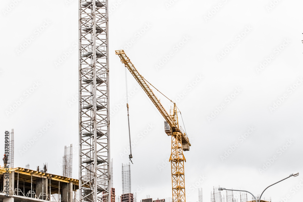 Tower industrial crane on construction site. Building design ...