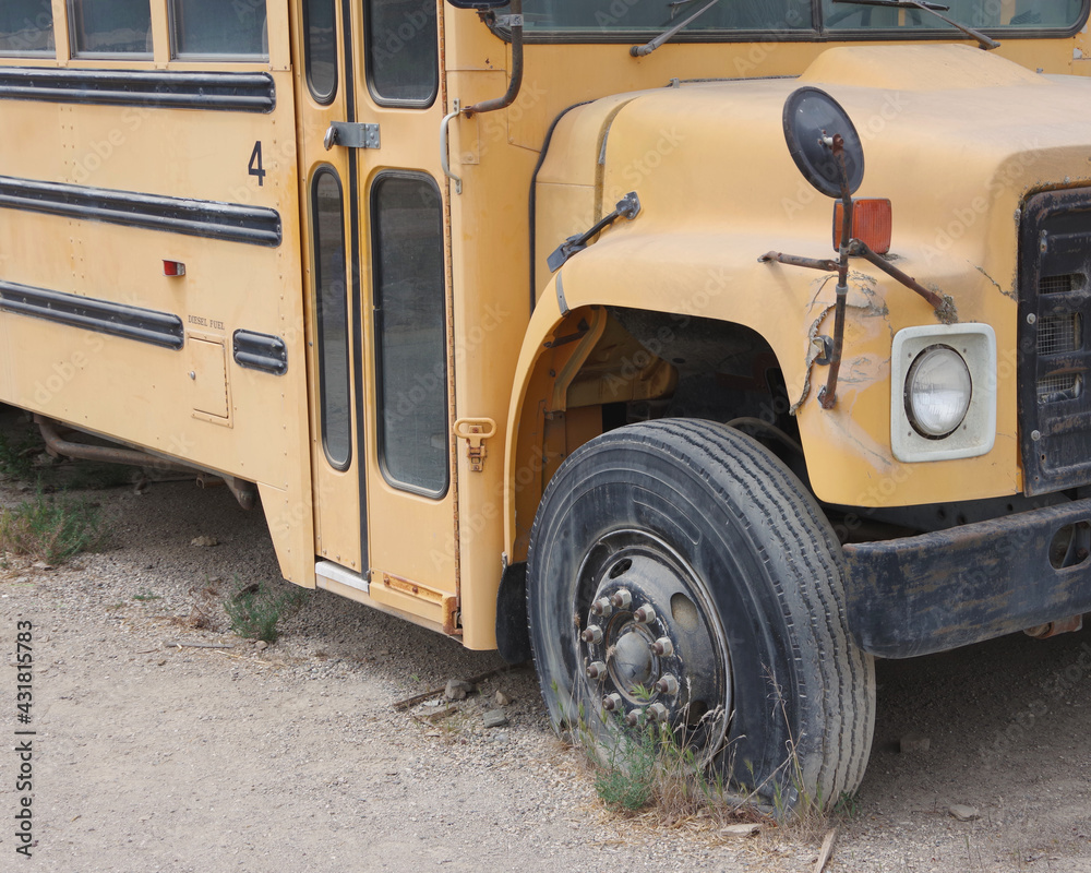 Old decommissioned school bus with a flat tire Stock Photo | Adobe Stock