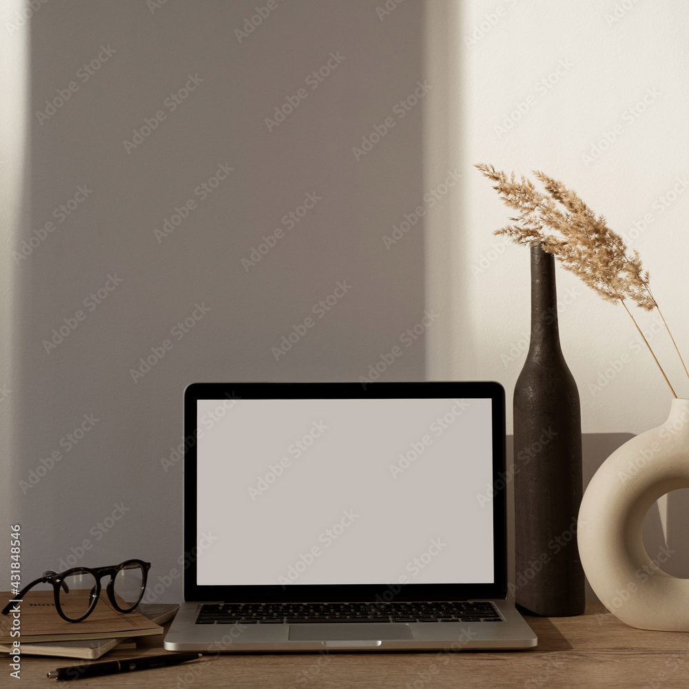 Aesthetic home office desk workspace with sunlight shadows on the wall ...