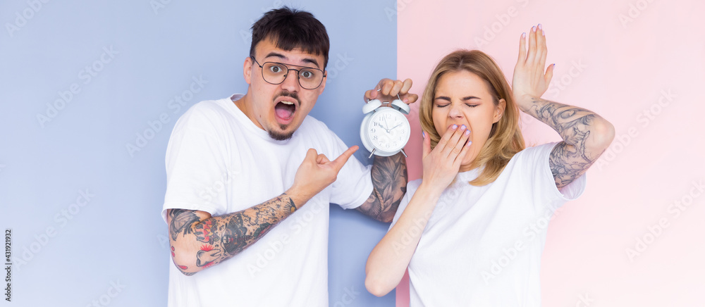 sleepy couple stressing at early morning. time management. punctuality ...