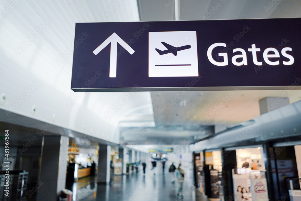 Sign in terminal with an arrow showing direction. Interior of the ...