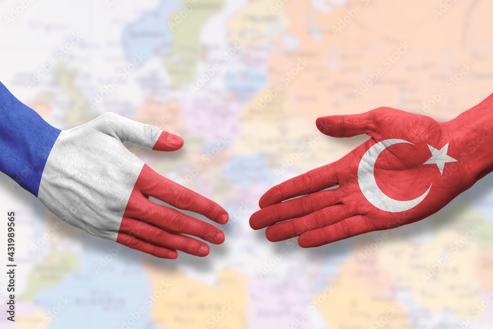 Turkey and France - Flag handshake symbolizing partnership and ...
