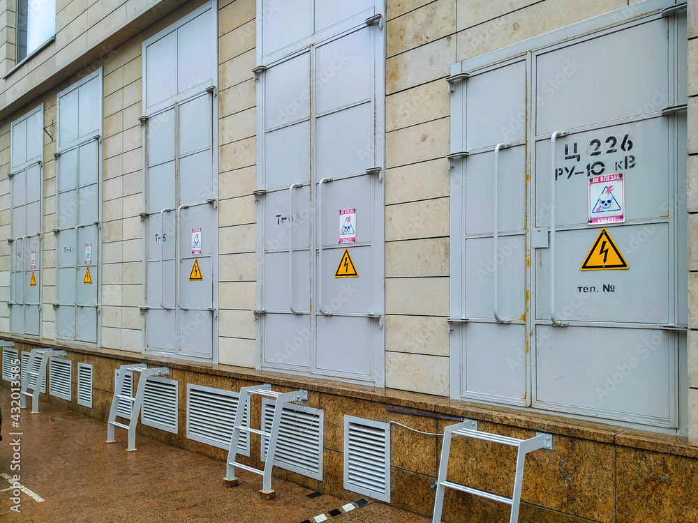 Technical light-gray metal doors to the premises of built-in ...