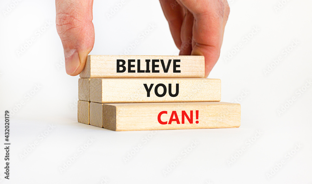 Believe you can symbol. Wooden blocks with words 'Believe you can ...