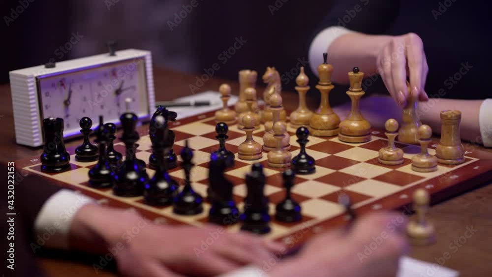 Two chess players man and woman play chess. Debut Accepted Queen's ...