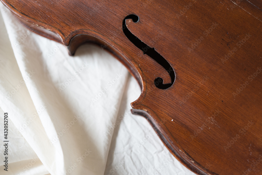 old, soundless violin with missing strings, fingerboard, sounding post ...