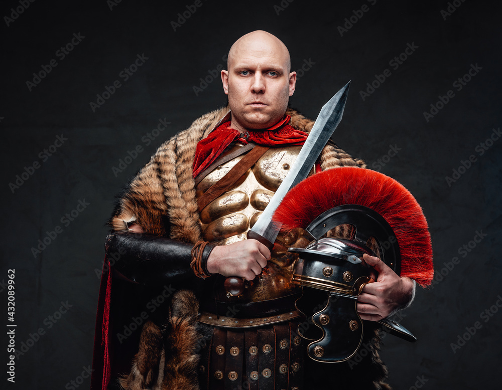 Serious roman soldier weared in fur and bronze armor Stock Photo ...