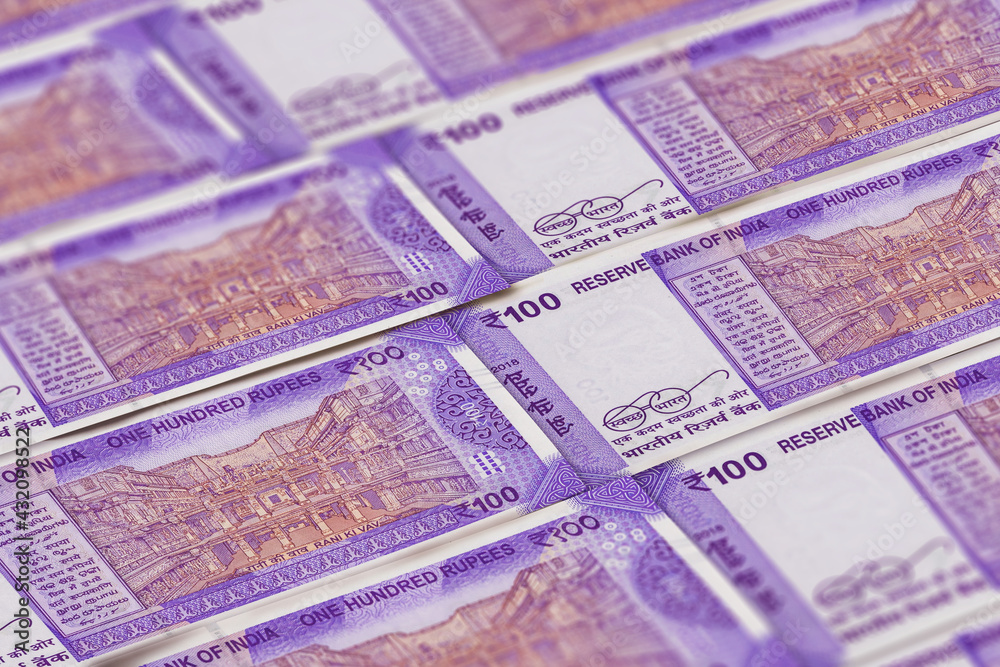 Indian rupees banknotes background. 100 INR Stock Photo | Adobe Stock