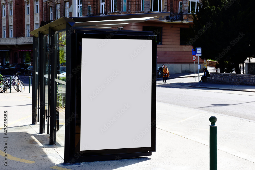 bus shelter at a busstop. blank billboard ad display. empty white ...