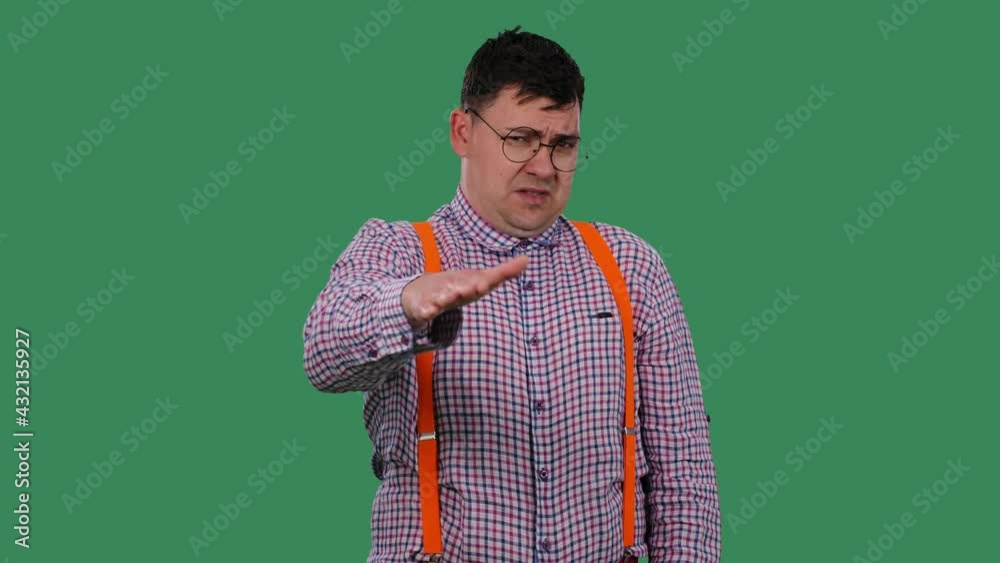 Vidéo Stock Portrait of a man looking at someone and waving his hand ...