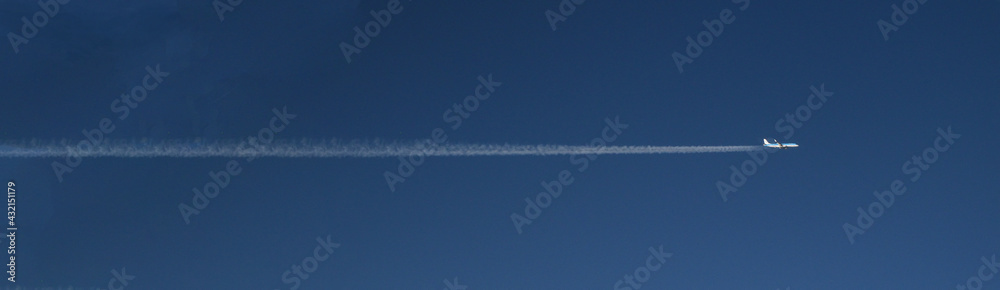 banner with airplane in the clear blue sky - horizontal trajectory of ...