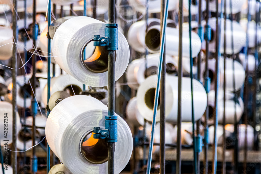 Cotton Thread Bobin on a copwinder weft assembly line loom Stock Photo ...