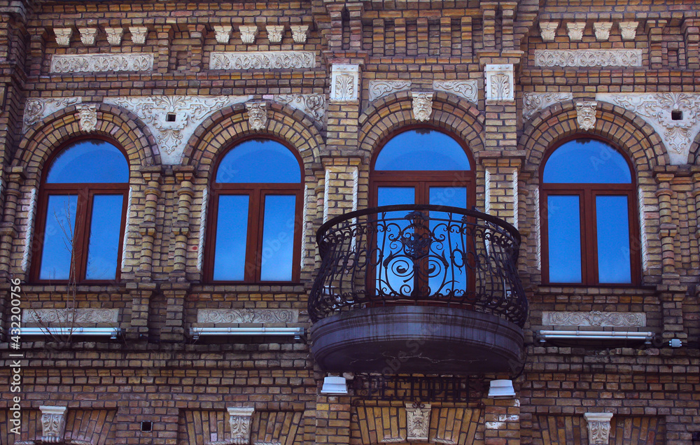 An old beautiful building with a wrought-iron balcony, beautiful ...