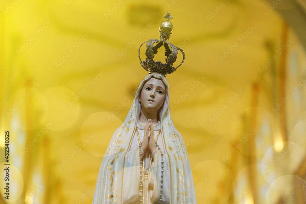 Statue of the image of Our Lady of Fatima Stock Photo | Adobe Stock