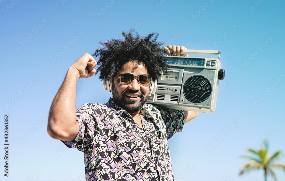 Man Holding Boombox