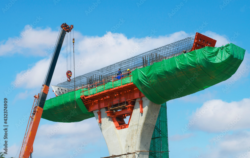 Worker rest on Highway overpass bridge structure, pillar concrete, work ...