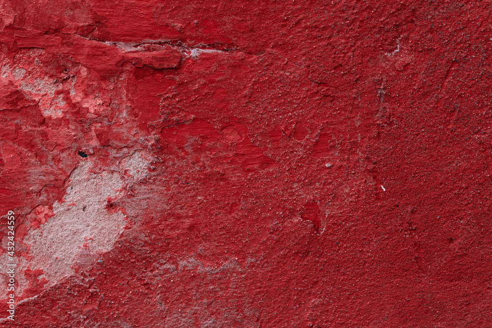 Texture of the red stucco wall with scratches, cracks, dust, crevices ...