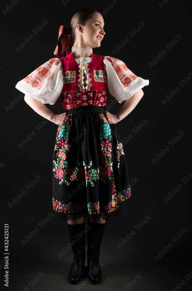 Young beautiful slovak woman in traditional dress. Slovak folklore ...