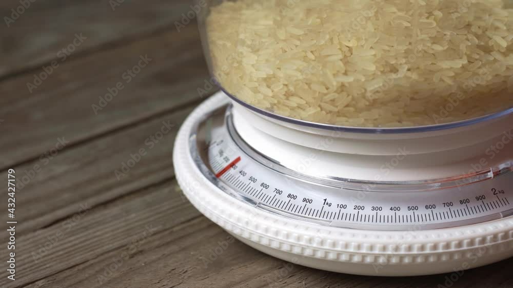 Kitchen mechanical scales. Weighing loose cereals rice millet. White ...