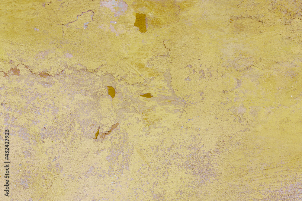 Texture of the lemon yellow stucco wall with scratches, cracks, dust ...