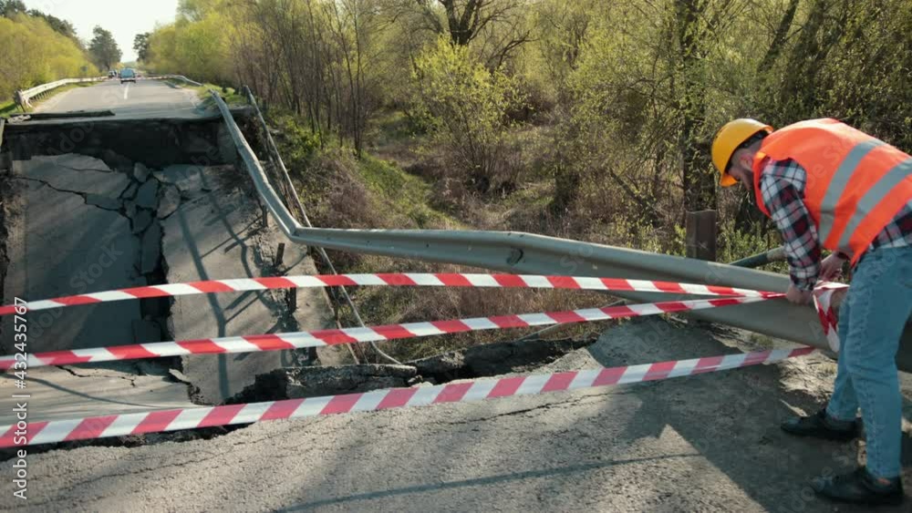 Vidéo Stock Flood damaged closed highway road, bridge. Cracked asphalt ...