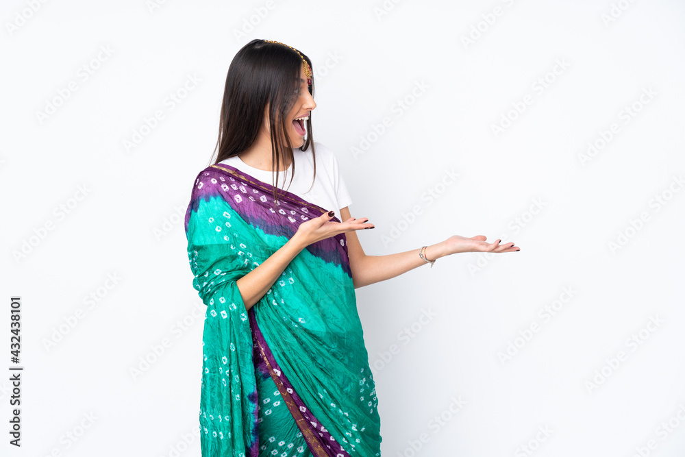 Young Indian woman isolated on white background with surprise facial ...