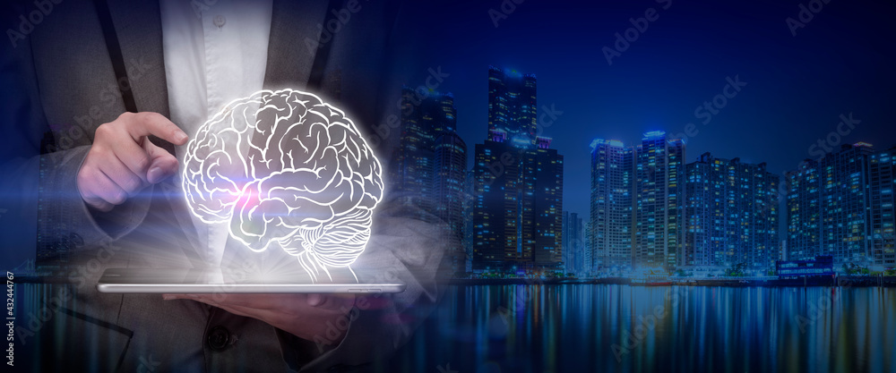 Businessman holding digital image of brains, Concept of creative ...