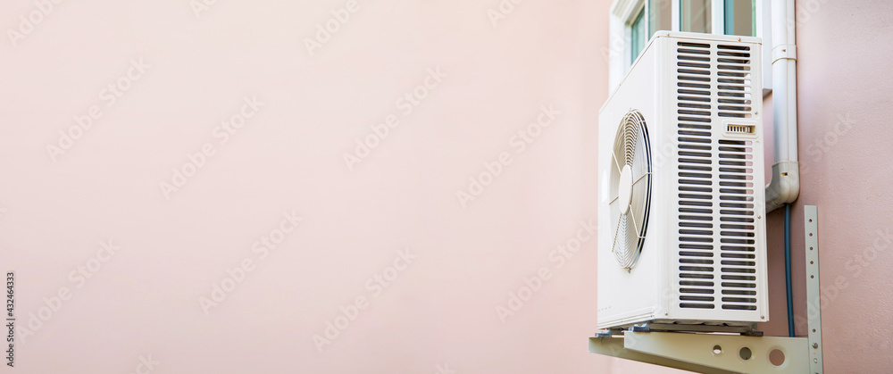 Air compressor, Close-up external split wall type of outdoor home air ...