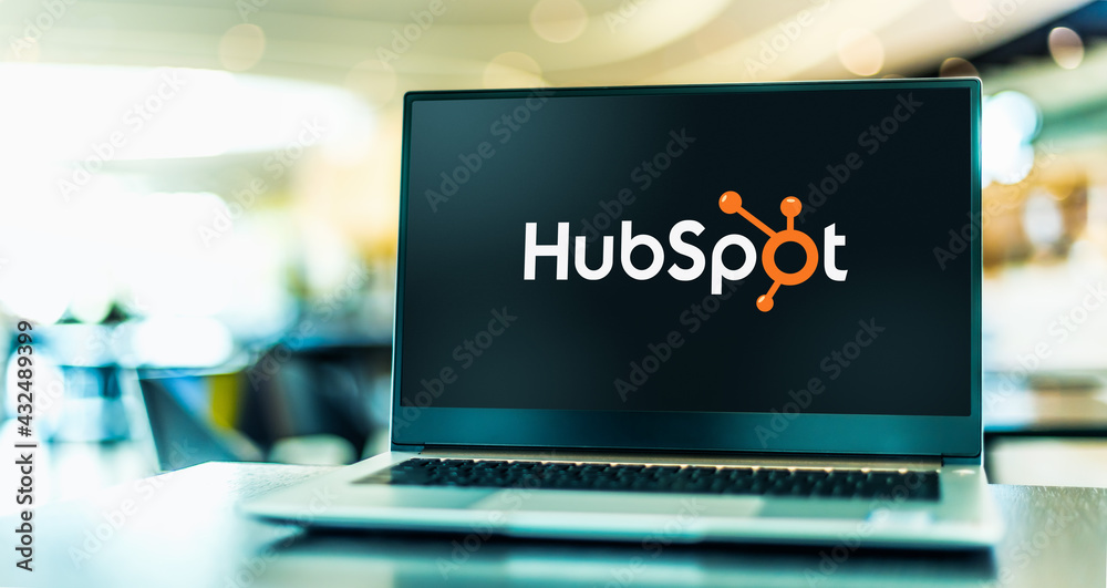 Laptop computer displaying logo of HubSpot Stock Photo | Adobe Stock